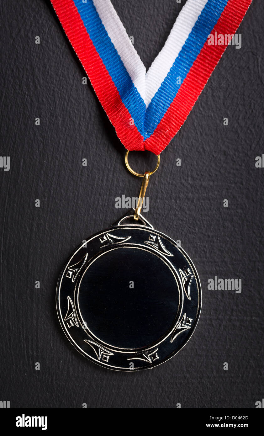 Metal medal with tricolor ribbon Stock Photo - Alamy