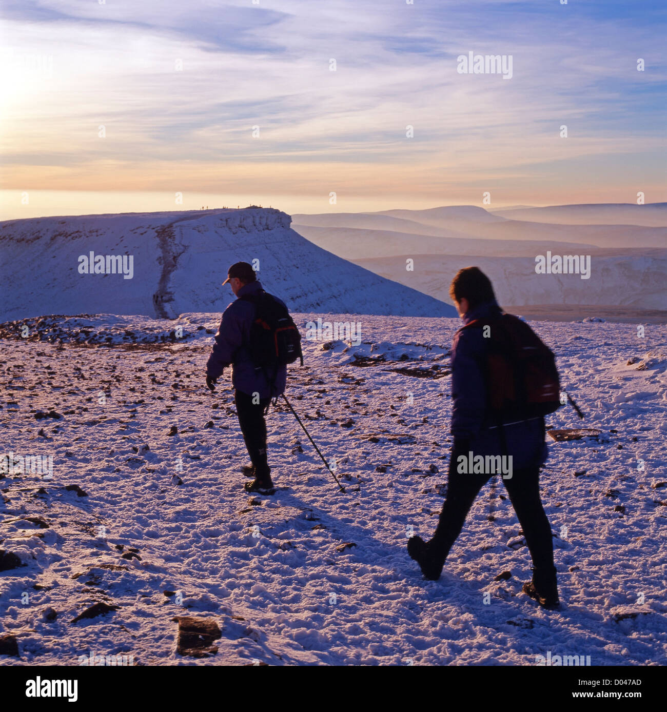 People walking atop Corn Du summit in the Brecon Beacons National Park ...