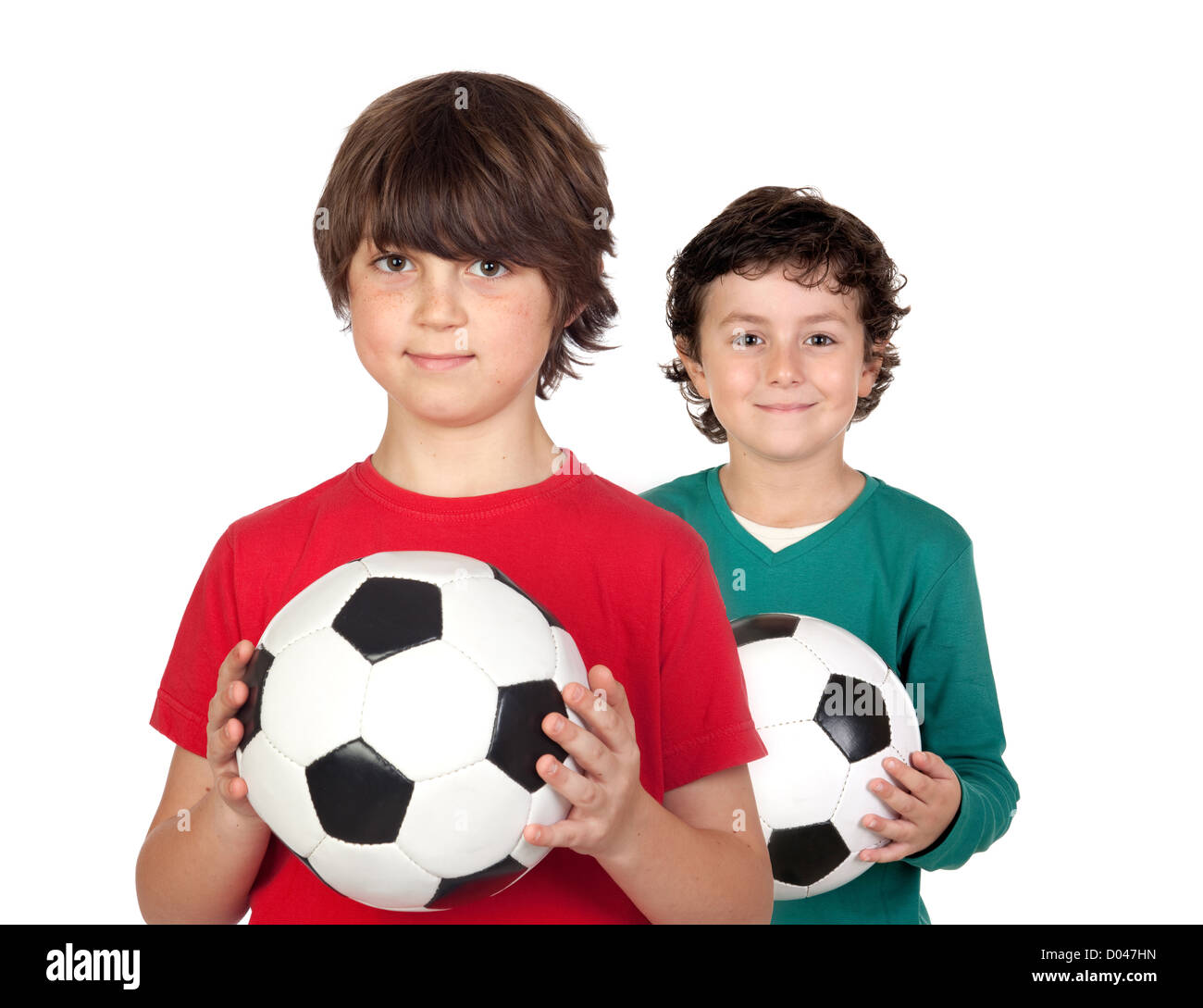 Two adorable children with balls on a over white background Stock Photo ...