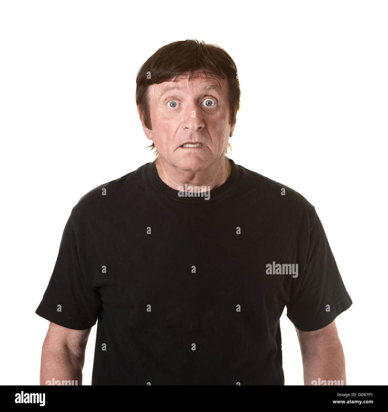 Mature Caucasian man with eyes wide open over white background Stock ...