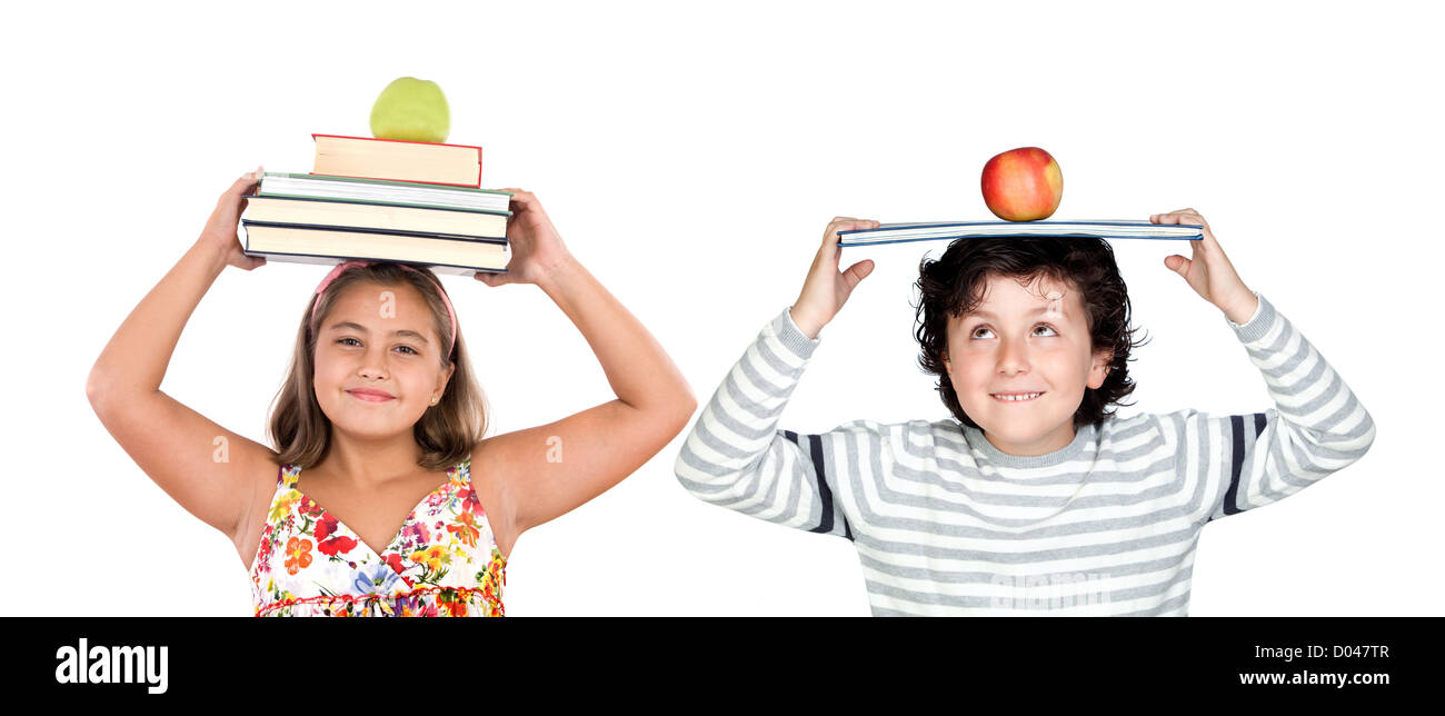 Adorable children with many books and apple on the head isolated over ...