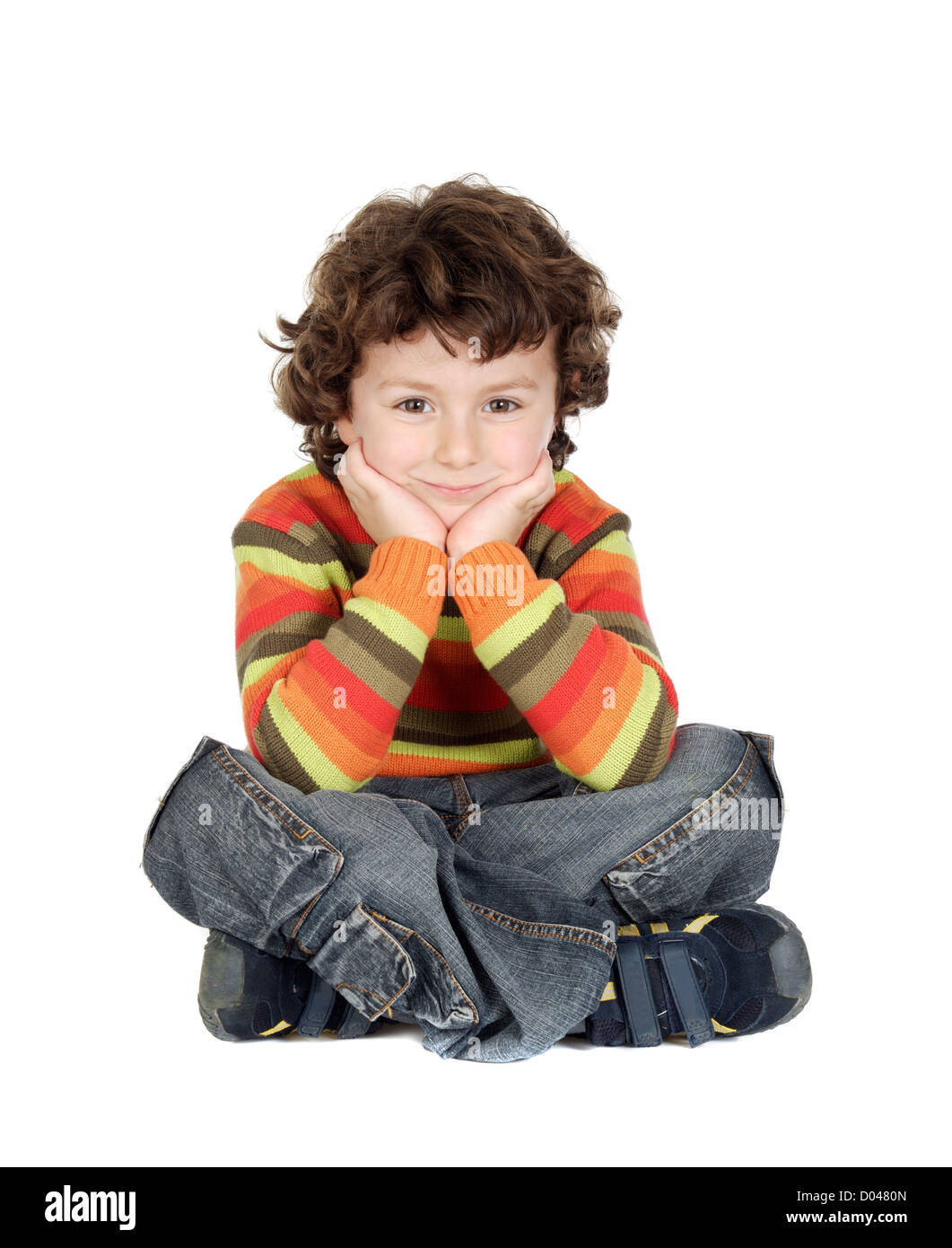 Adorable caucasian boy sitting isolated over white Stock Photo - Alamy