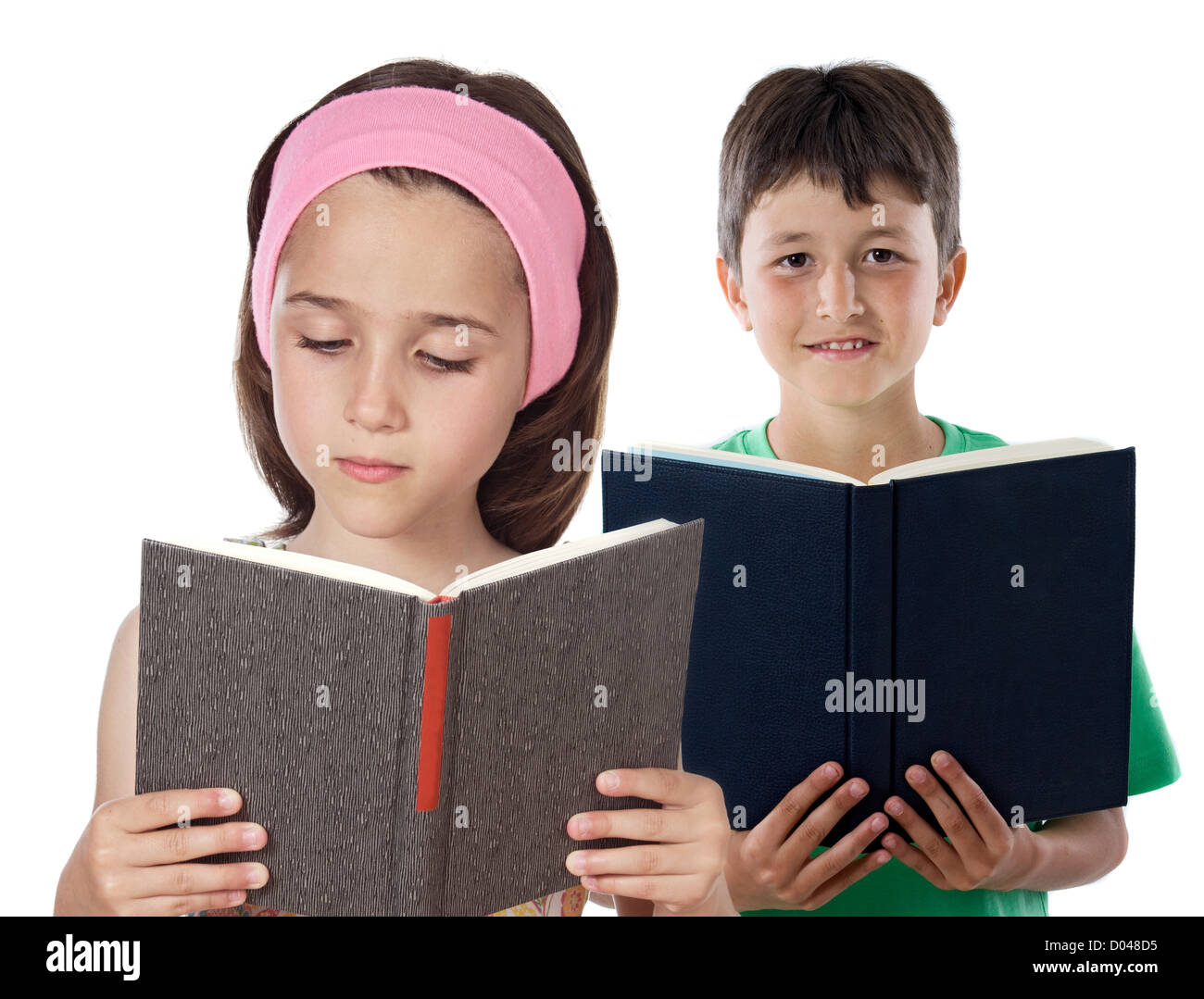 Two children reading on a over white background Stock Photo - Alamy
