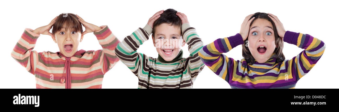 Three funny children surprised on a white background Stock Photo - Alamy