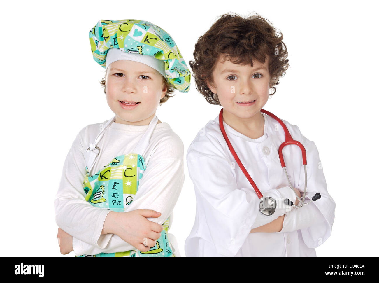 Little doctor and cook on a over white background Stock Photo - Alamy