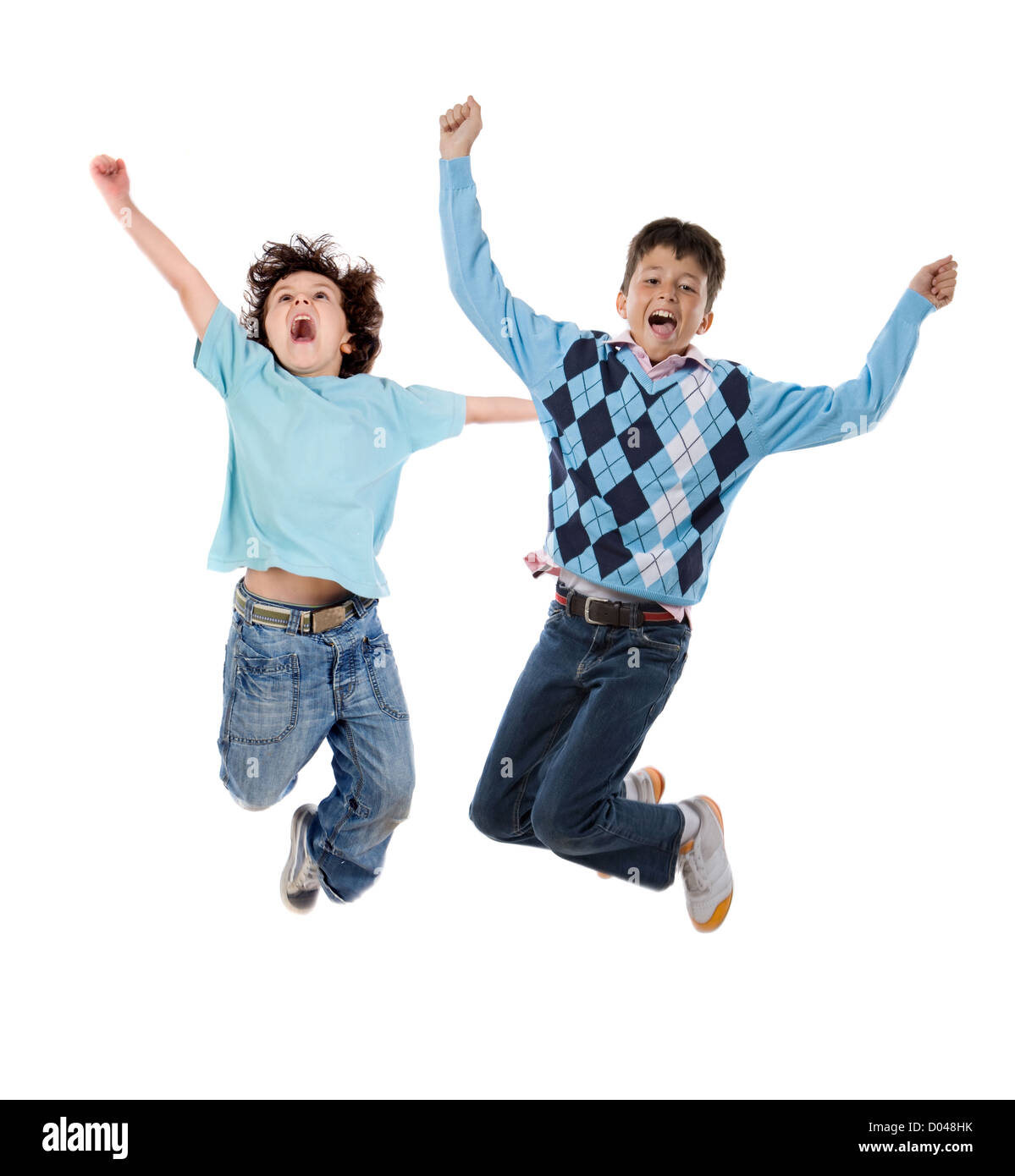 Two happy children jumping at once on a white background Stock Photo ...