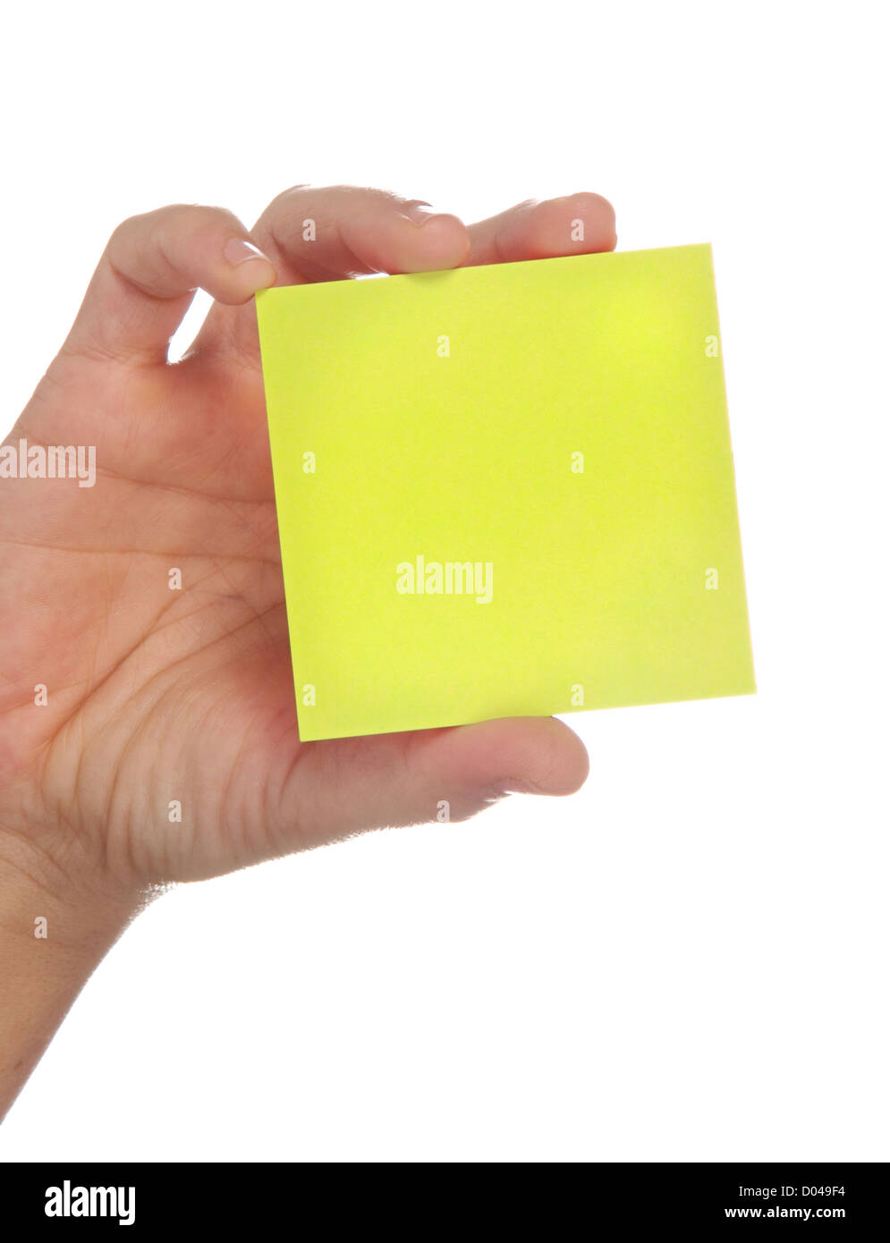 Hand holding a yellow note isolated over white Stock Photo - Alamy