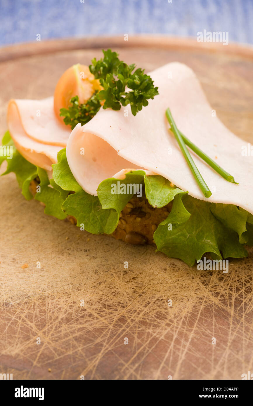 photo of delicious crispy cereals bread with an slice of turkey Stock ...