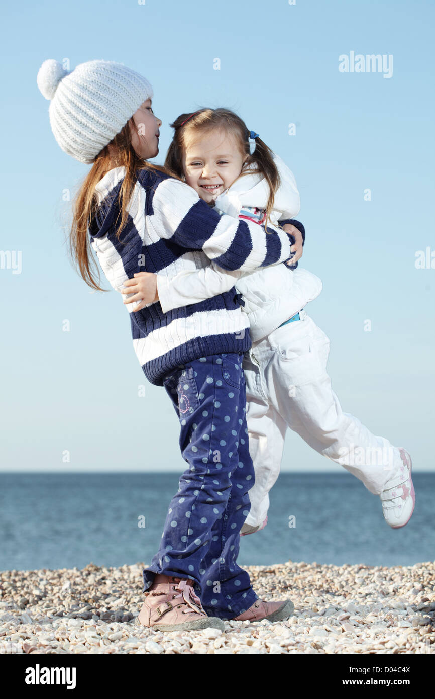 Kids at the beach Stock Photo - Alamy
