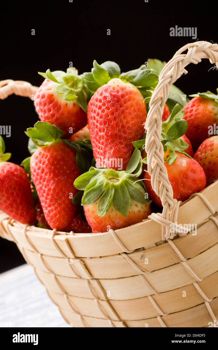photo of delicious red strawberries inside a basket Stock Photo - Alamy