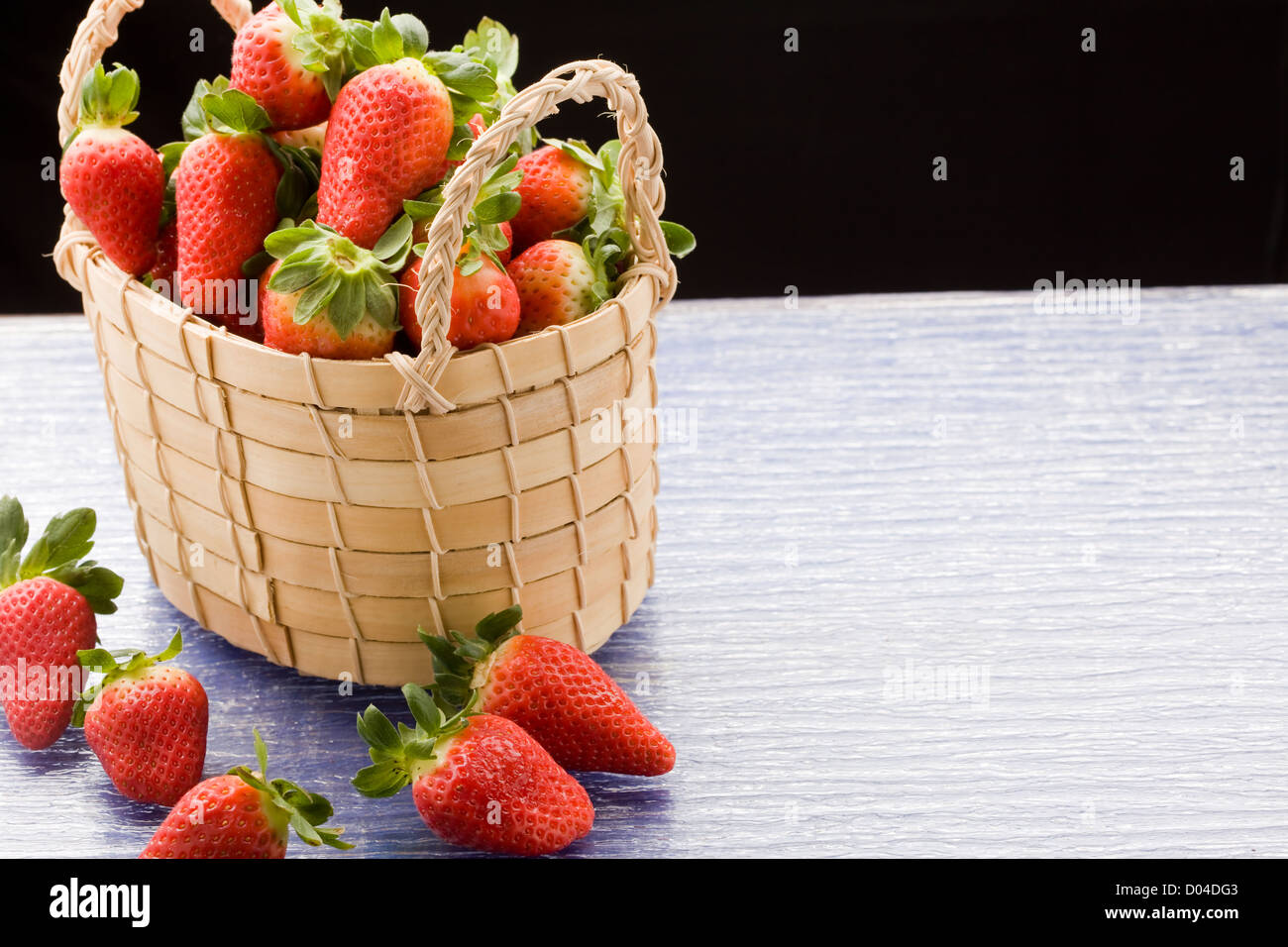 photo of delicious red strawberries inside a basket Stock Photo - Alamy