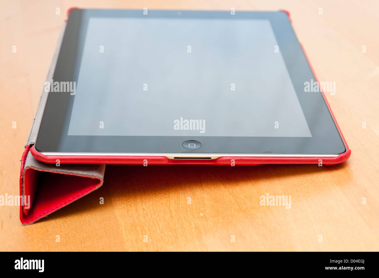 Ipad tablet computer in red cover case Stock Photo - Alamy
