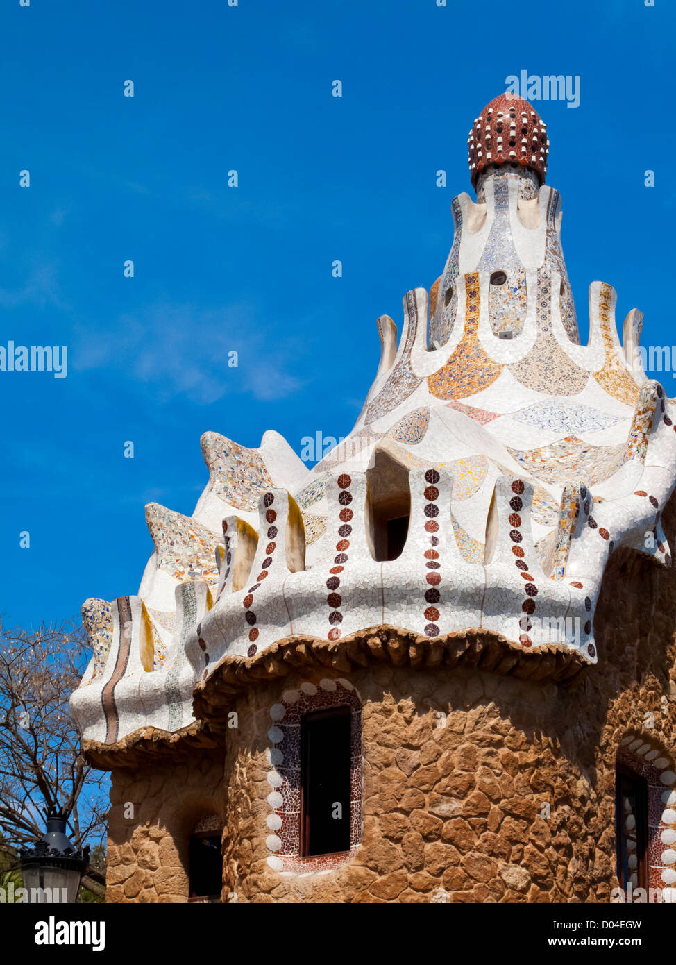 Detail of building with mosaic roof by Antoni Gaudi in Parc Guell ...
