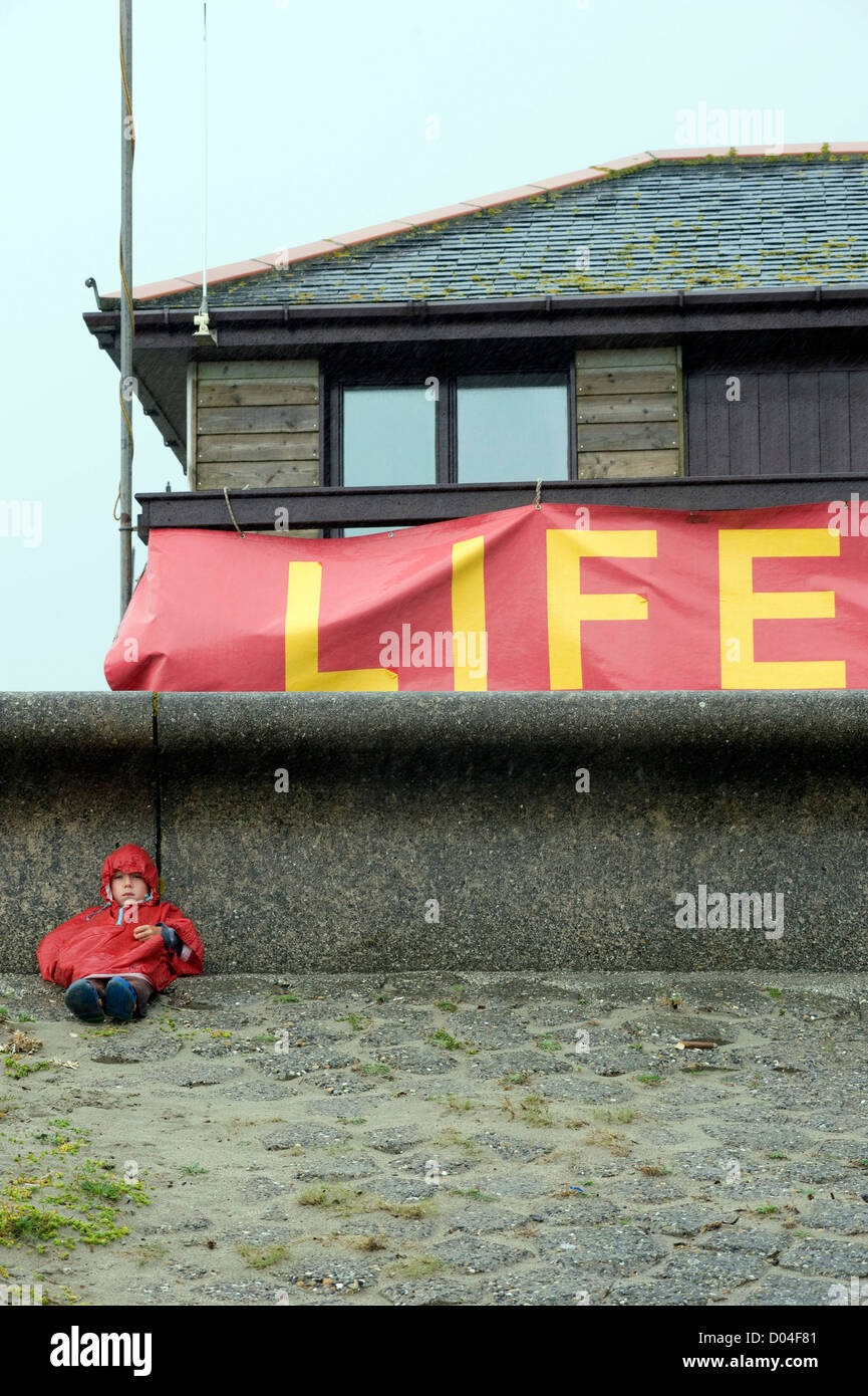 Soaking wet boy hi-res stock photography and images - Alamy