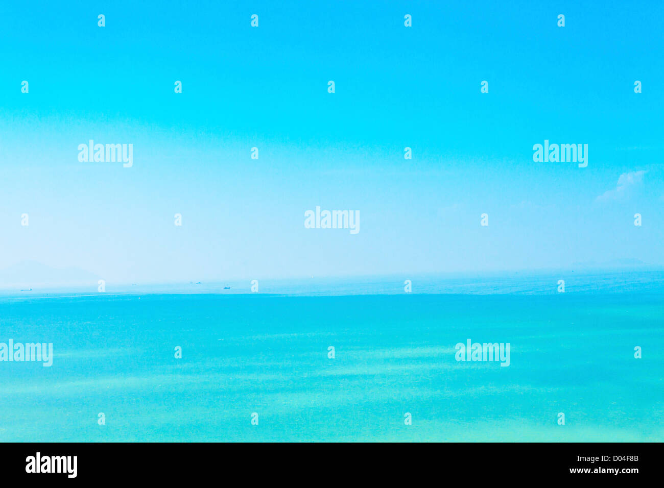 Blue sky leaving for horizon above a blue surface of the sea Stock Photo - Alamy