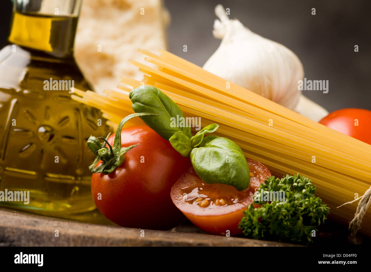 photo of different ingredients for preparing pasta with tomato sauce ...