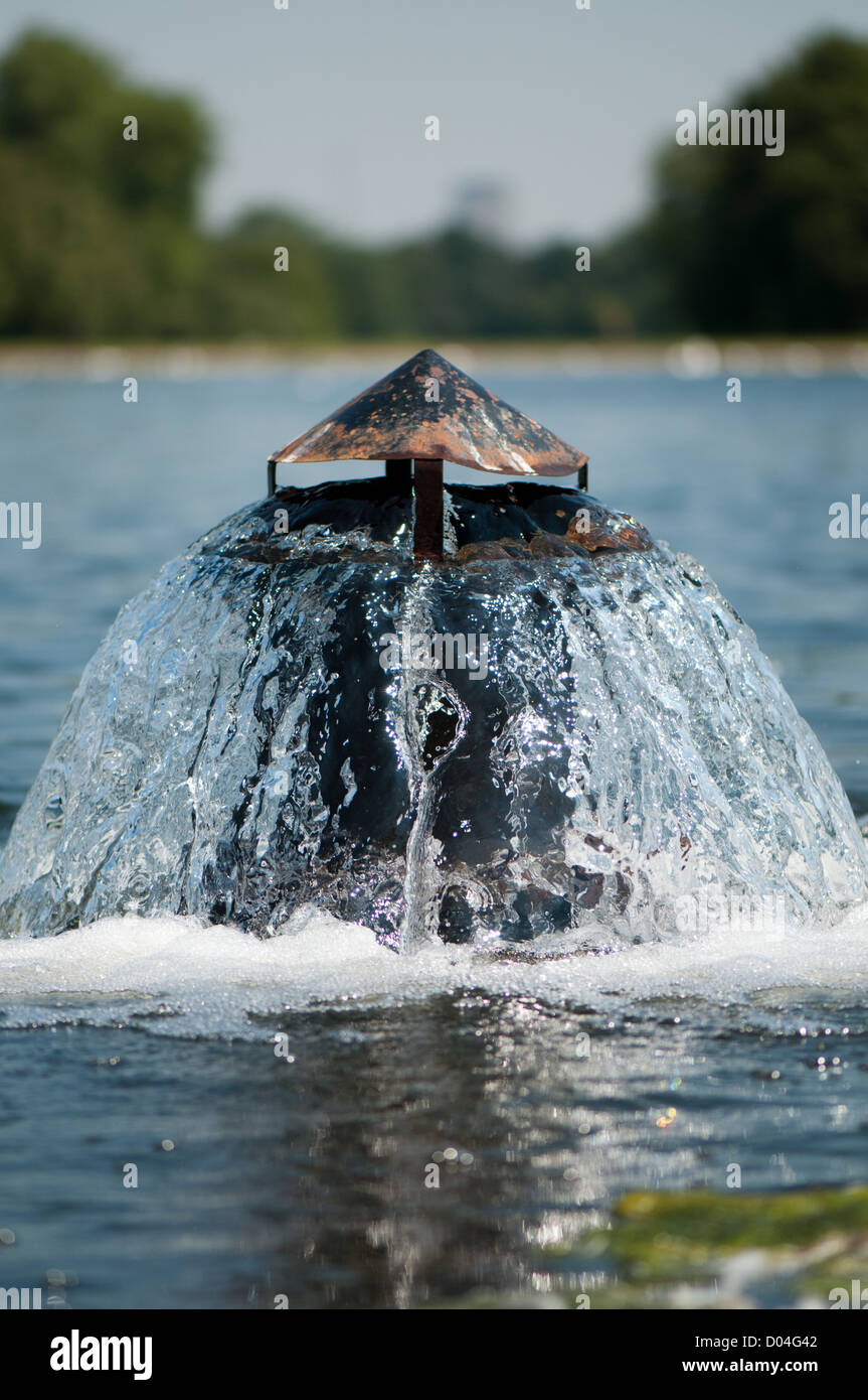 Water spout or fountain with water flowing out. Small fountain or water ...