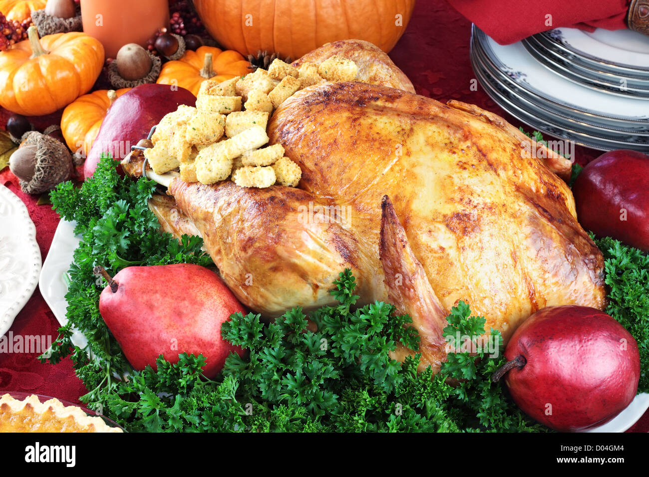 Thanksgiving or Christmas turkey dinner with fresh red pears and ...