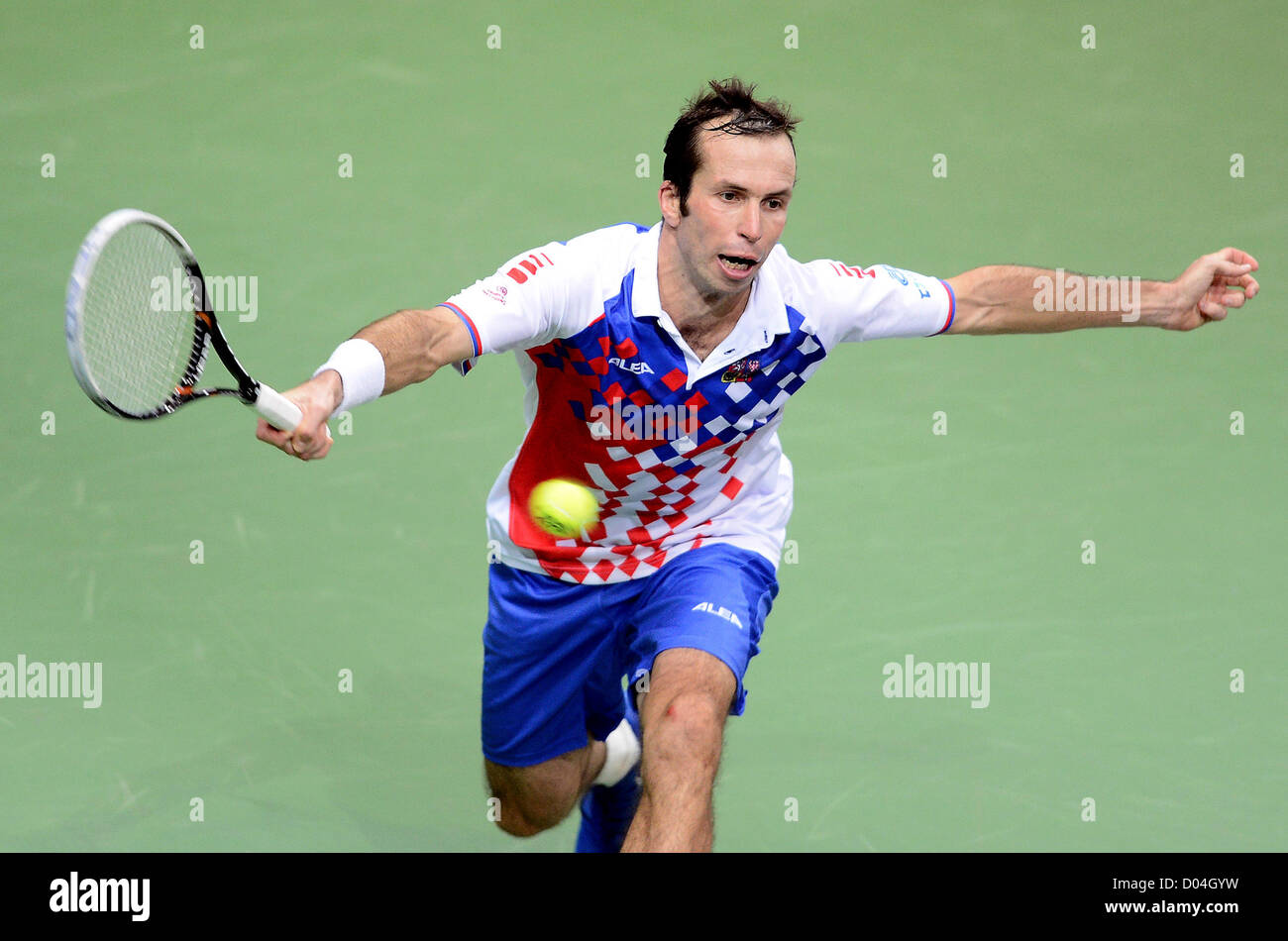 Radek Stepanek of Czech Republic returns a ball to Spain's David Ferrer ...