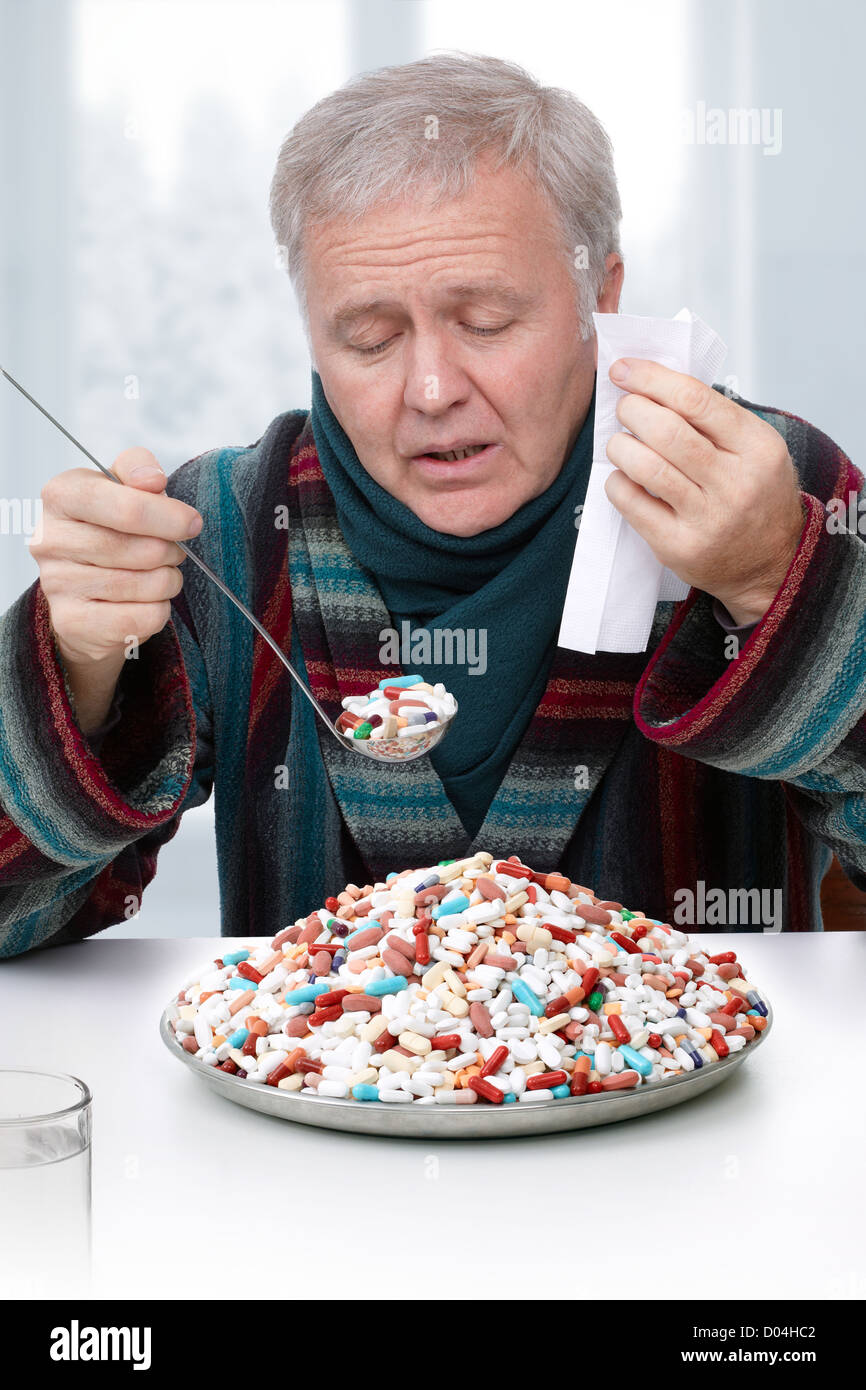 Senior doing exaggerated treatment with drugs Stock Photo - Alamy