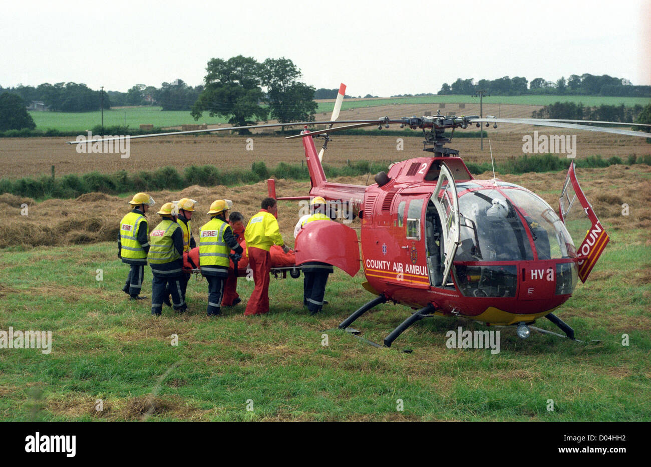 Emergency services officers carry injured patient to County Air ...