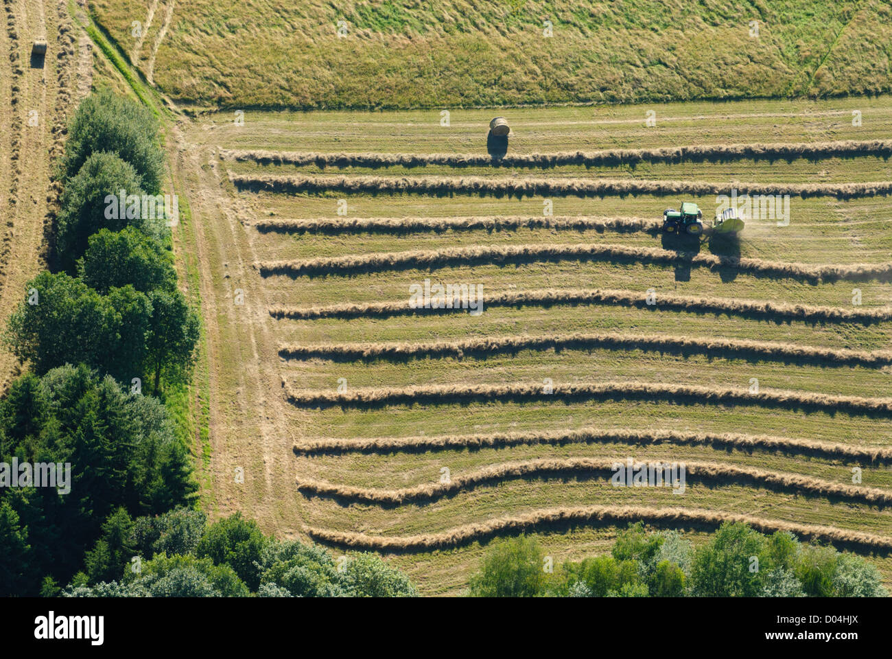 Aerial view of tractor in harvest, East of Moselle, Lorraine, France ...