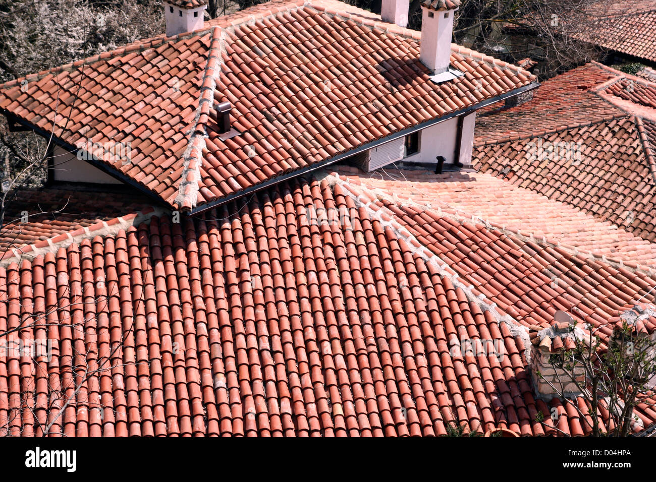 Red tile roof with chimney Stock Photo - Alamy