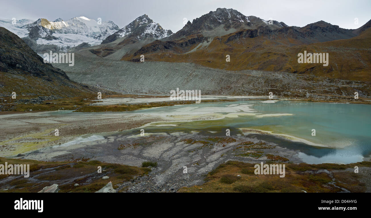 flat glacier lake before entering the reservoir Lac de Moiry in the ...