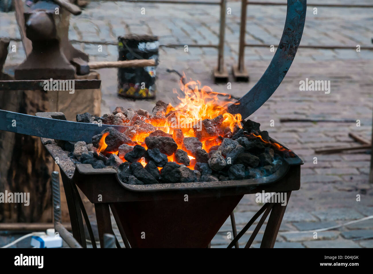 Old-fashioned blacksmith furnace with burning coals Stock Photo - Alamy