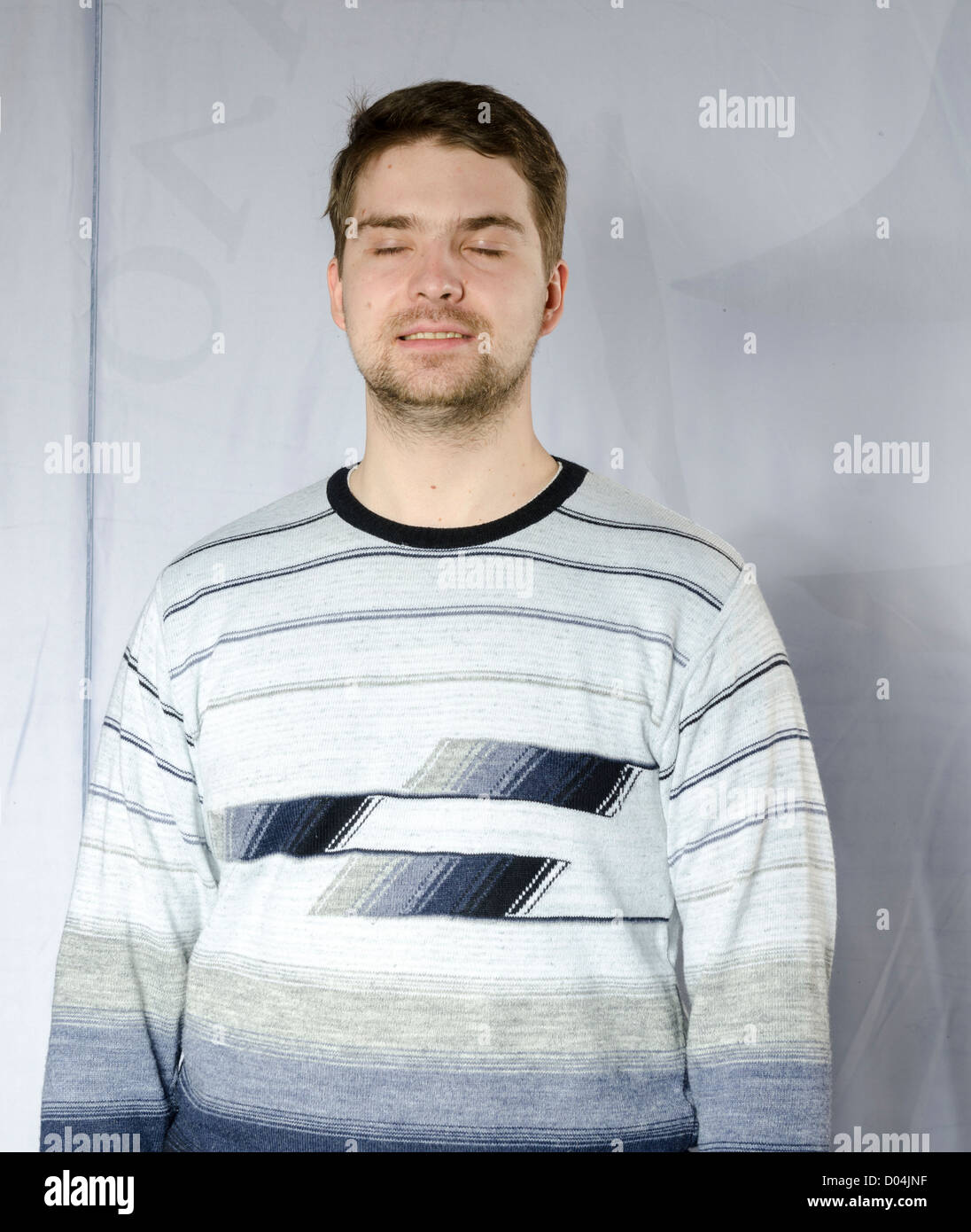 young man closed eyes Stock Photo - Alamy