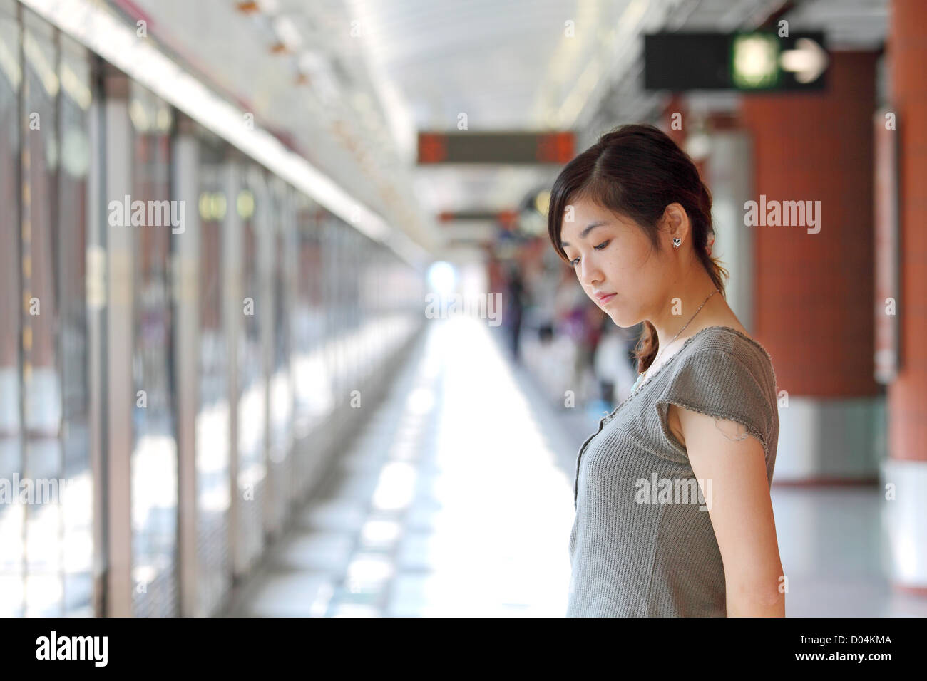 A sad asian woman Stock Photo - Alamy