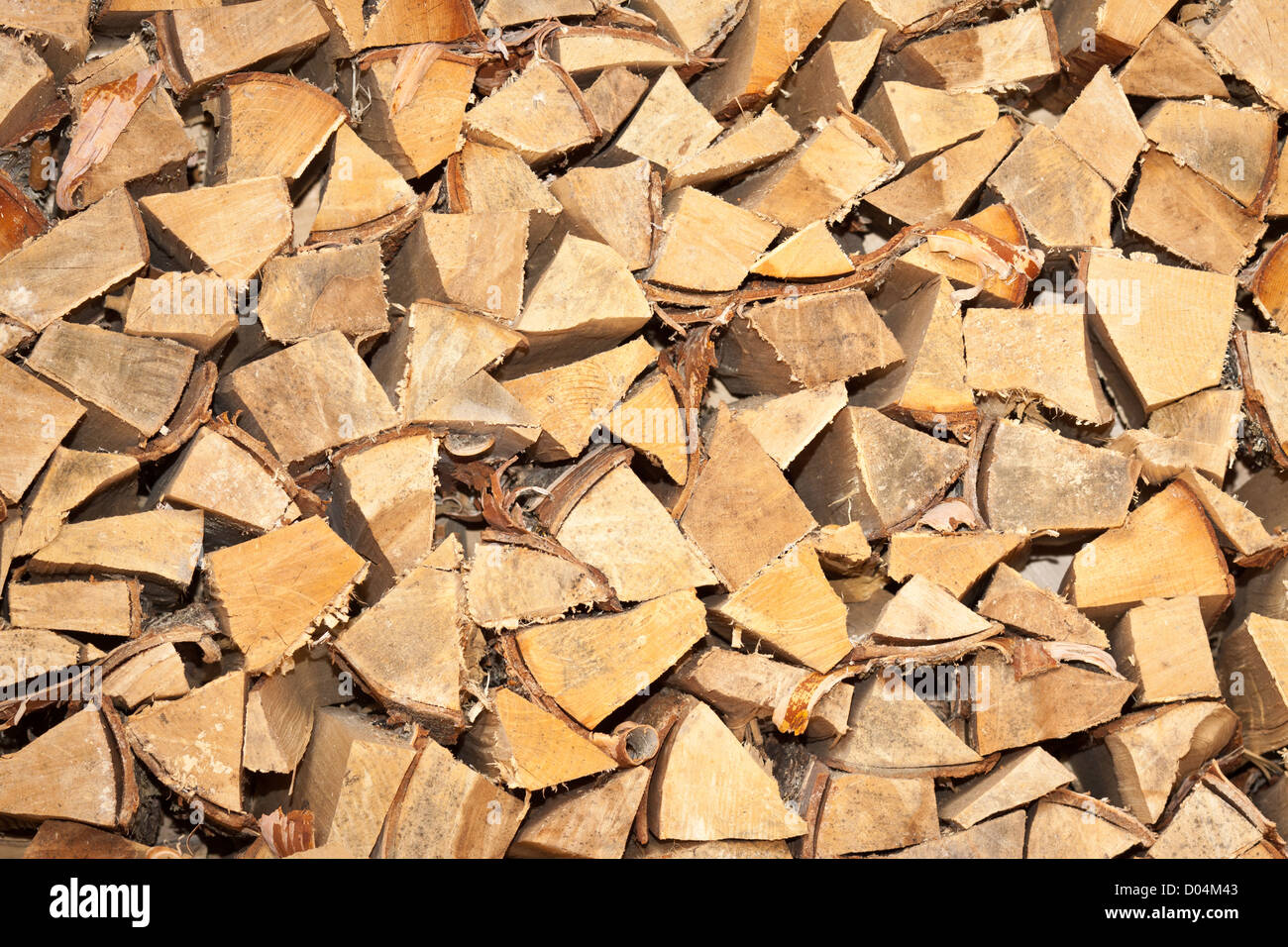 Stacked fire wood background Stock Photo - Alamy