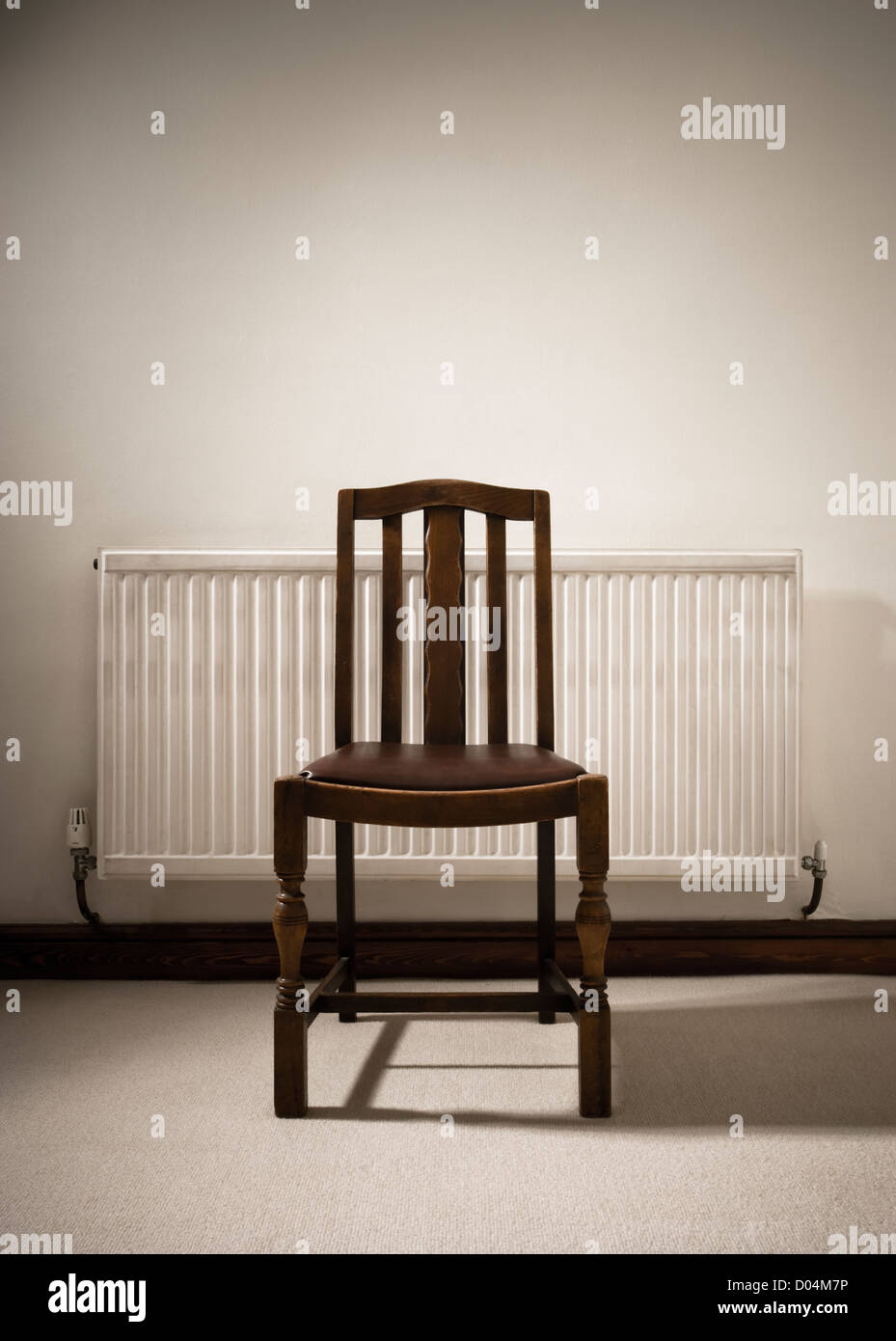 Chair and radiator Stock Photo - Alamy