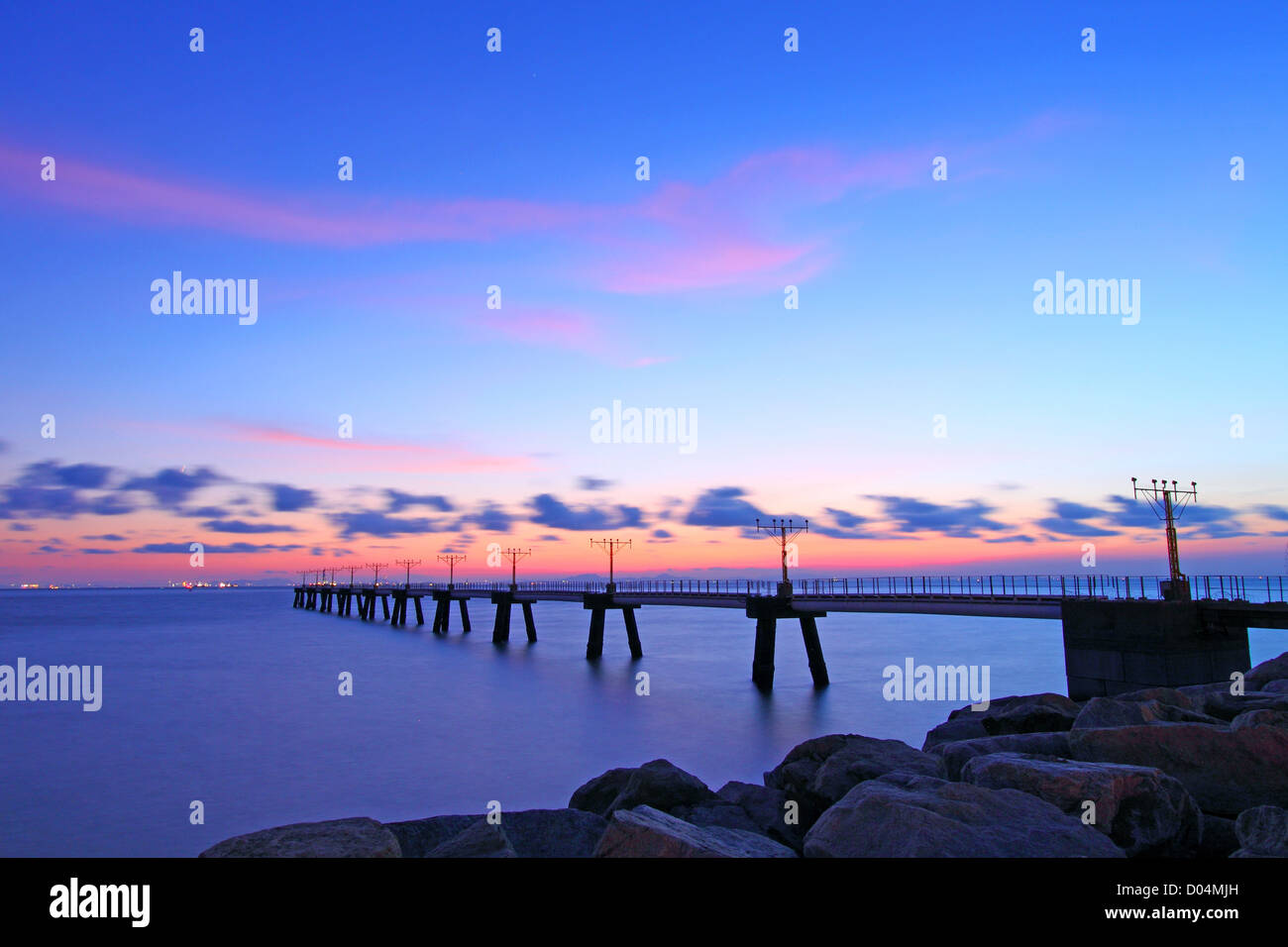 Sunset view on runway lights Stock Photo - Alamy