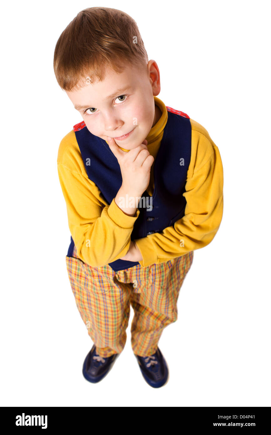 Pensive boy standing looking up isolated on white Stock Photo - Alamy