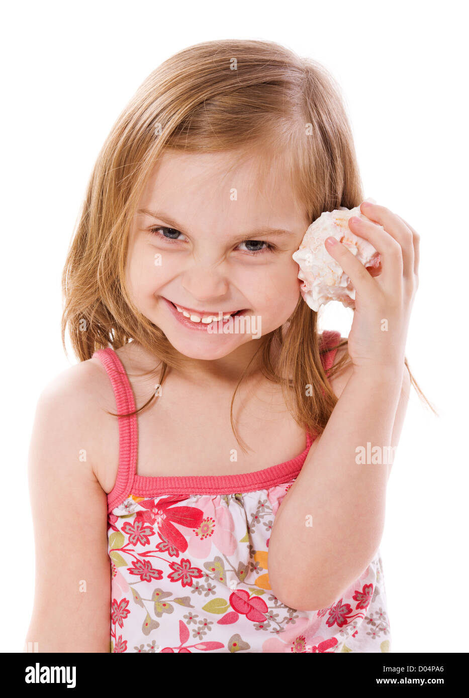 cheerful Little Girl listening shell isolated on white Stock Photo - Alamy