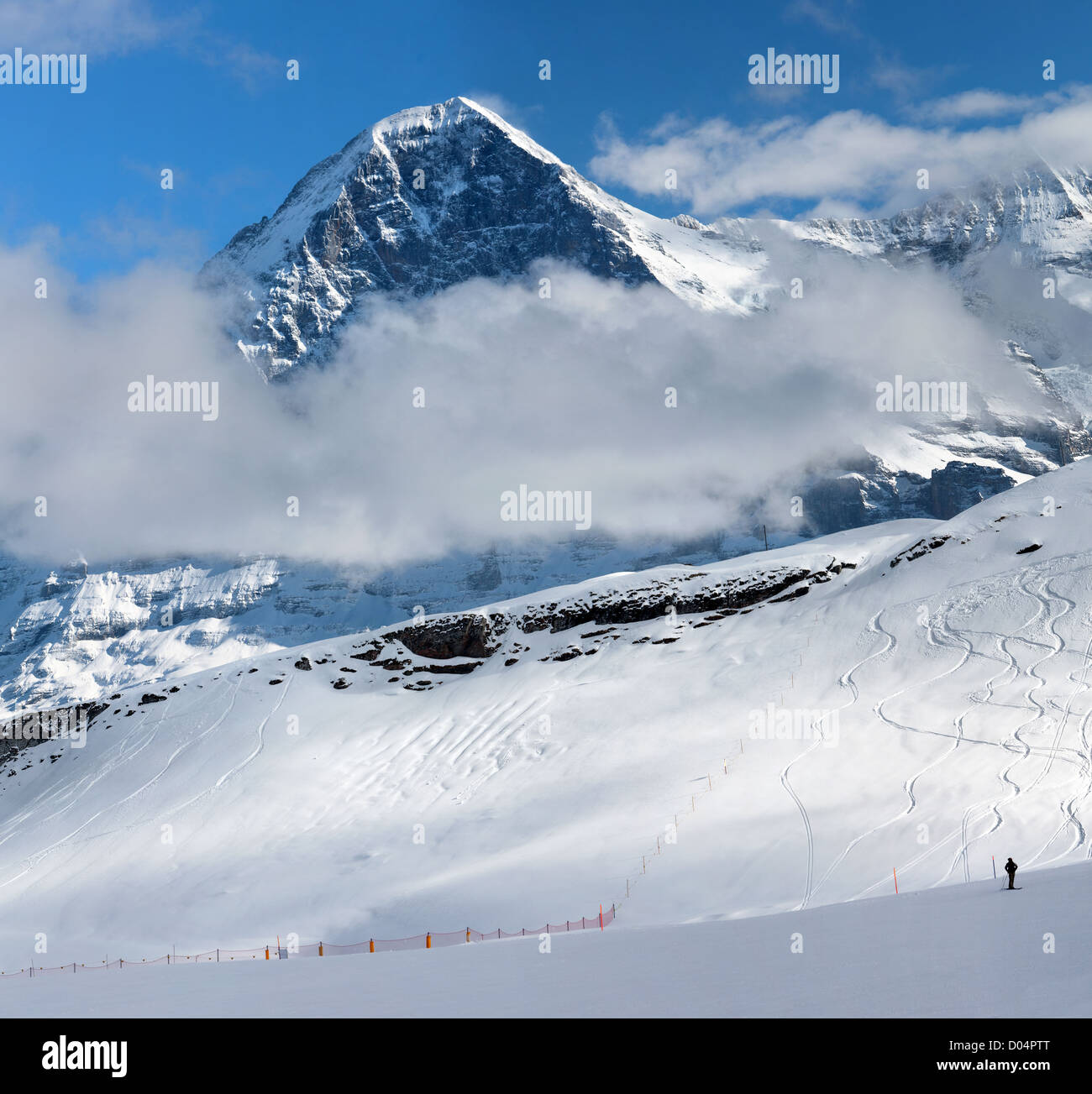 Ski slope in the background of Mount Eiger The Eiger is a mountain in ...