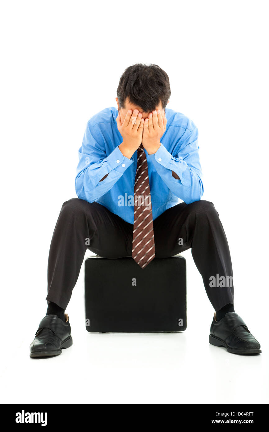 businessman with hands over face Stock Photo - Alamy
