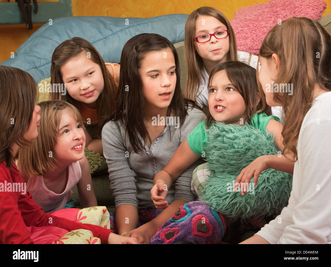 Little girl tells a story at a sleepover Stock Photo - Alamy