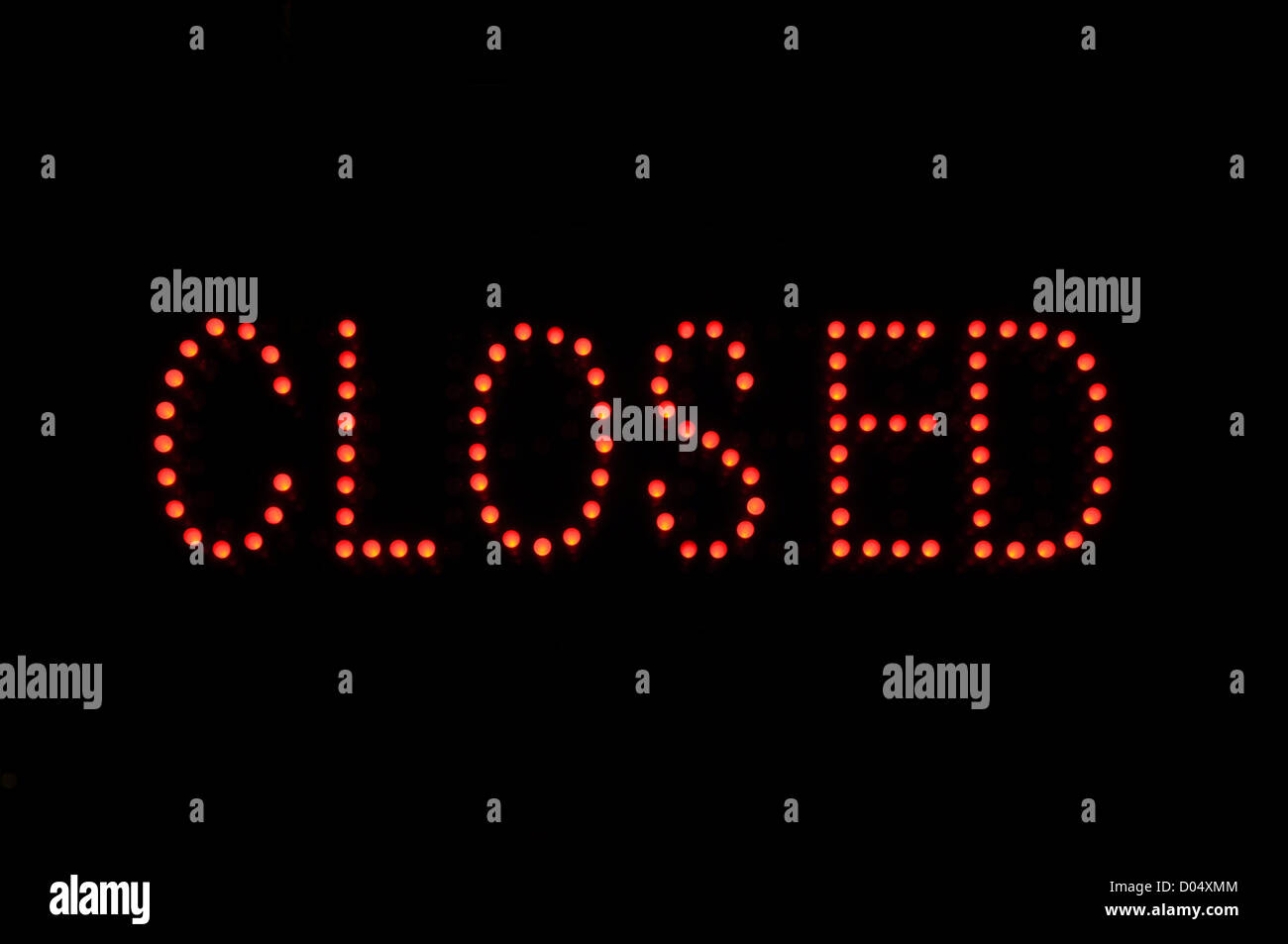 Closed Red Neon Sign with Black Background Stock Photo - Alamy