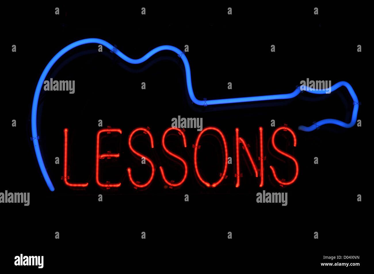 Guitar Lessons Electric Neon Blue and Red Sign Light Stock Photo - Alamy