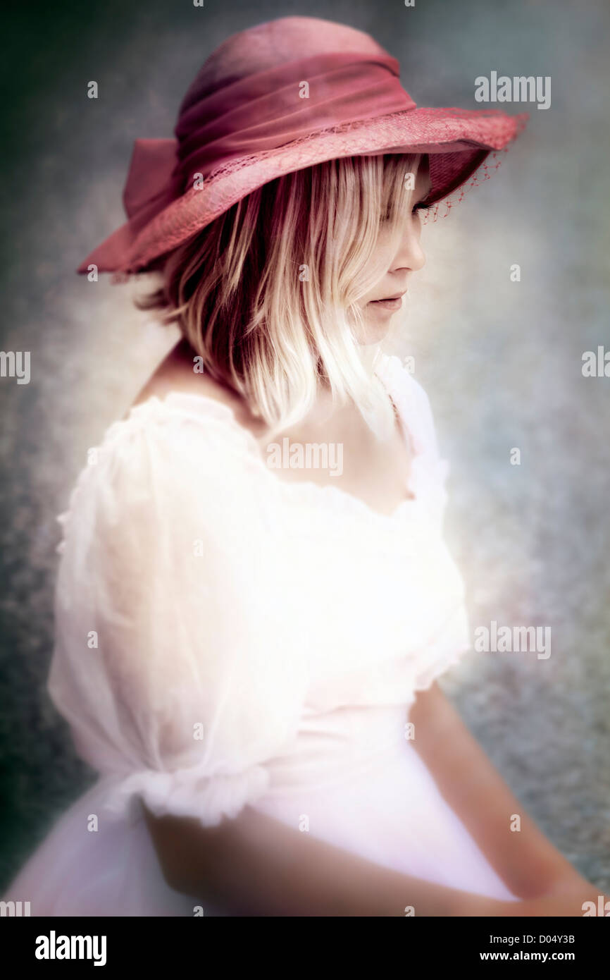 portrait of a beautiful woman with red hat Stock Photo - Alamy