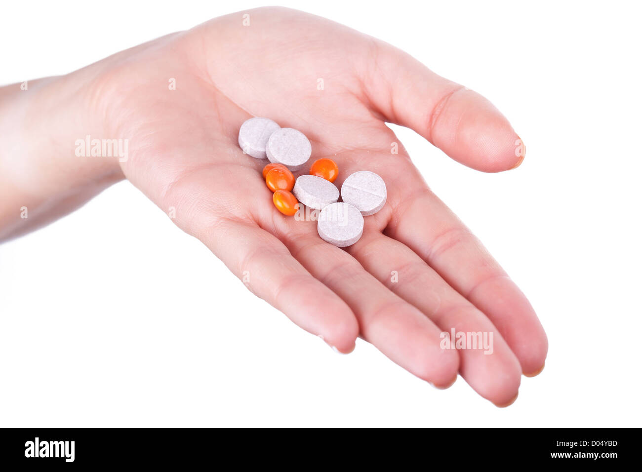 Hand with pills, closeup on white Stock Photo - Alamy