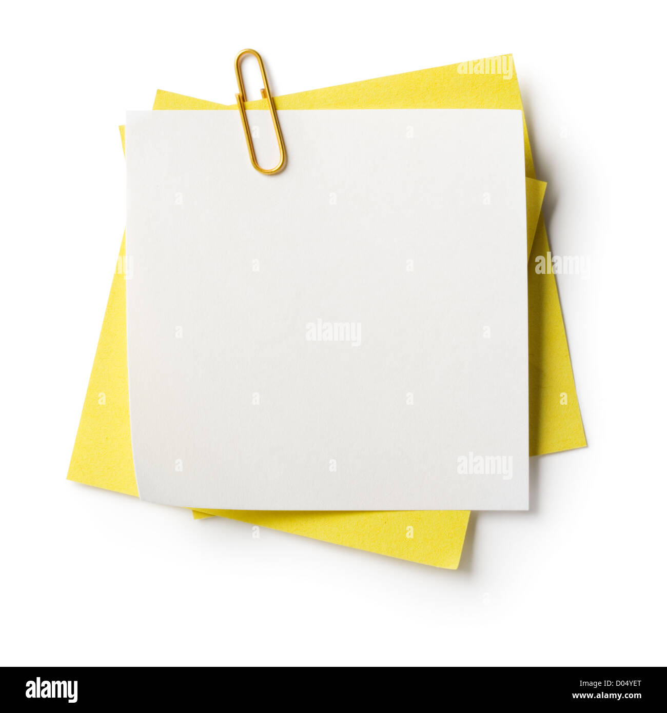 White and yellow note papers with paperclip on white background Stock ...