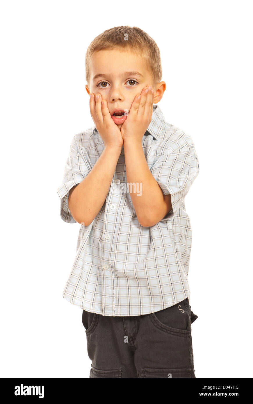 Amazed child boy holding hands on face isolated on white background ...
