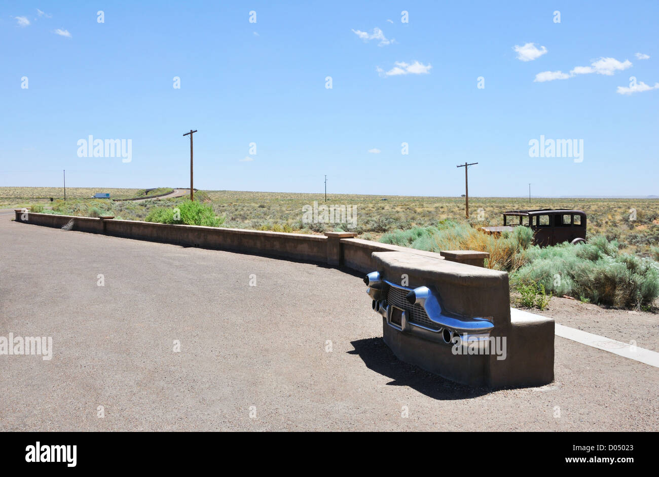 Old rusted car and retro style bench decorated with bumper, Route 66 ...