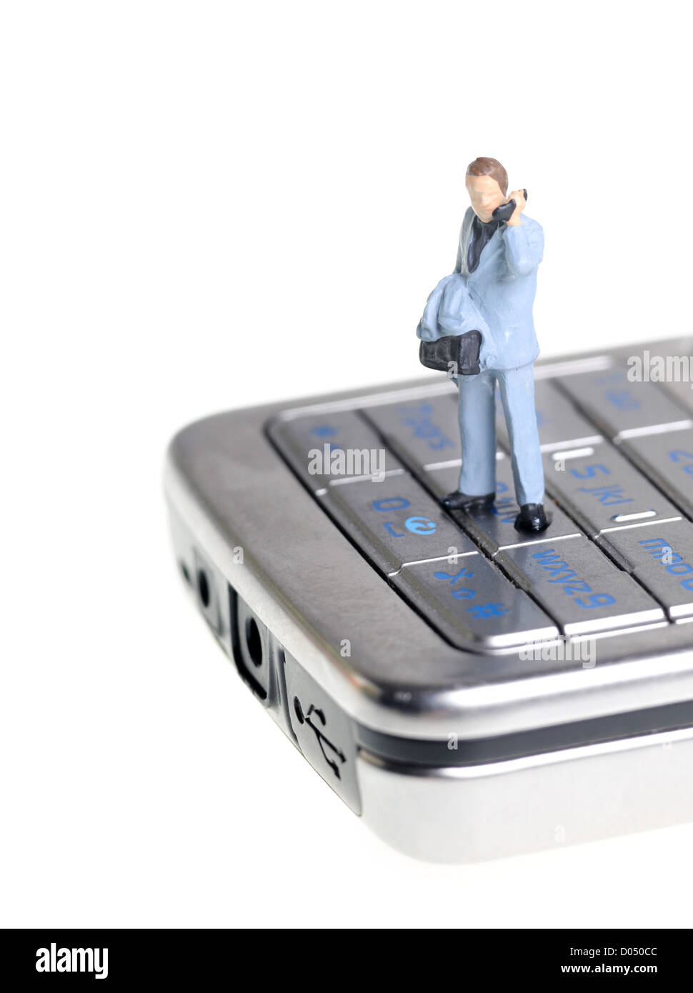 Tiny figure talking hi-res stock photography and images - Alamy