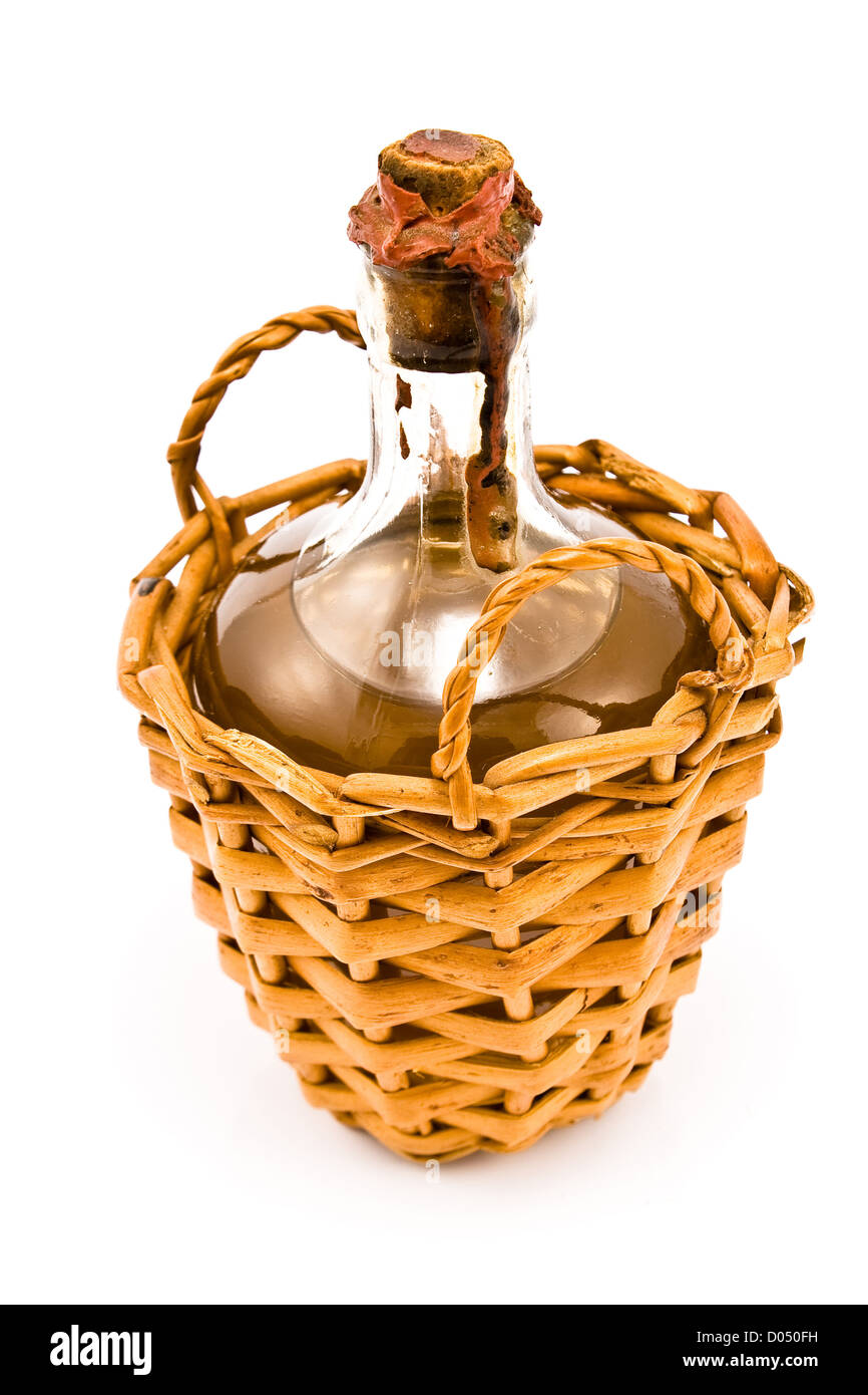 Old sealed bottle of white wine isolated on white Stock Photo - Alamy