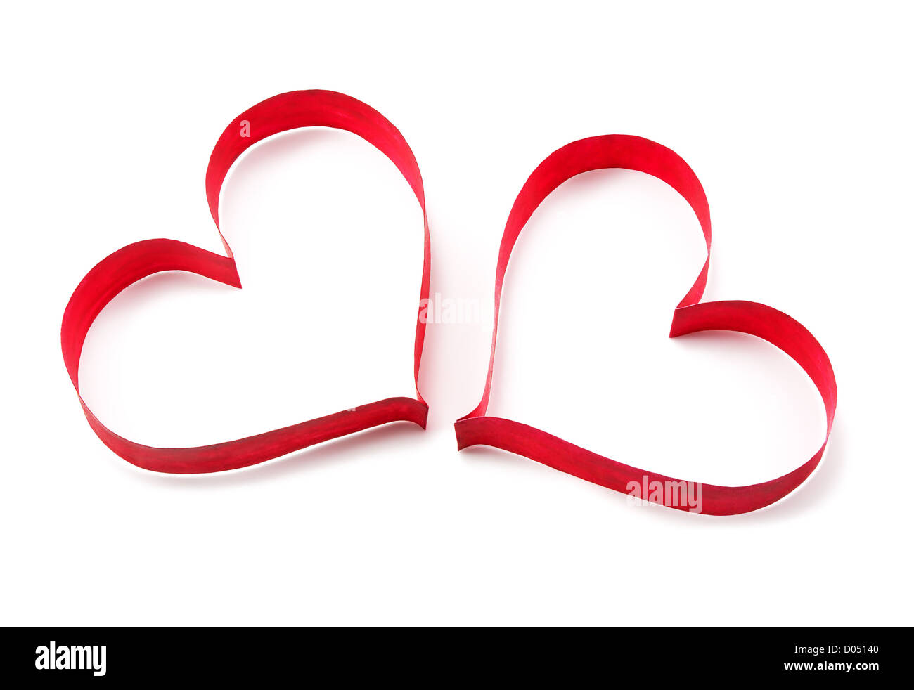 Paper hearts on red Cut Out Stock Images & Pictures - Alamy