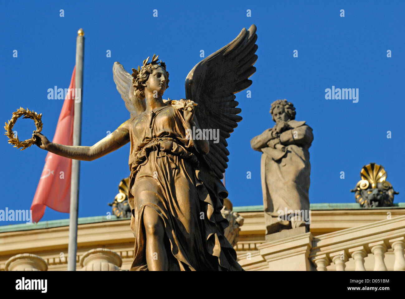 Prague, Czech Republic. Rudolfinum concert hall. Angel and statue of ...
